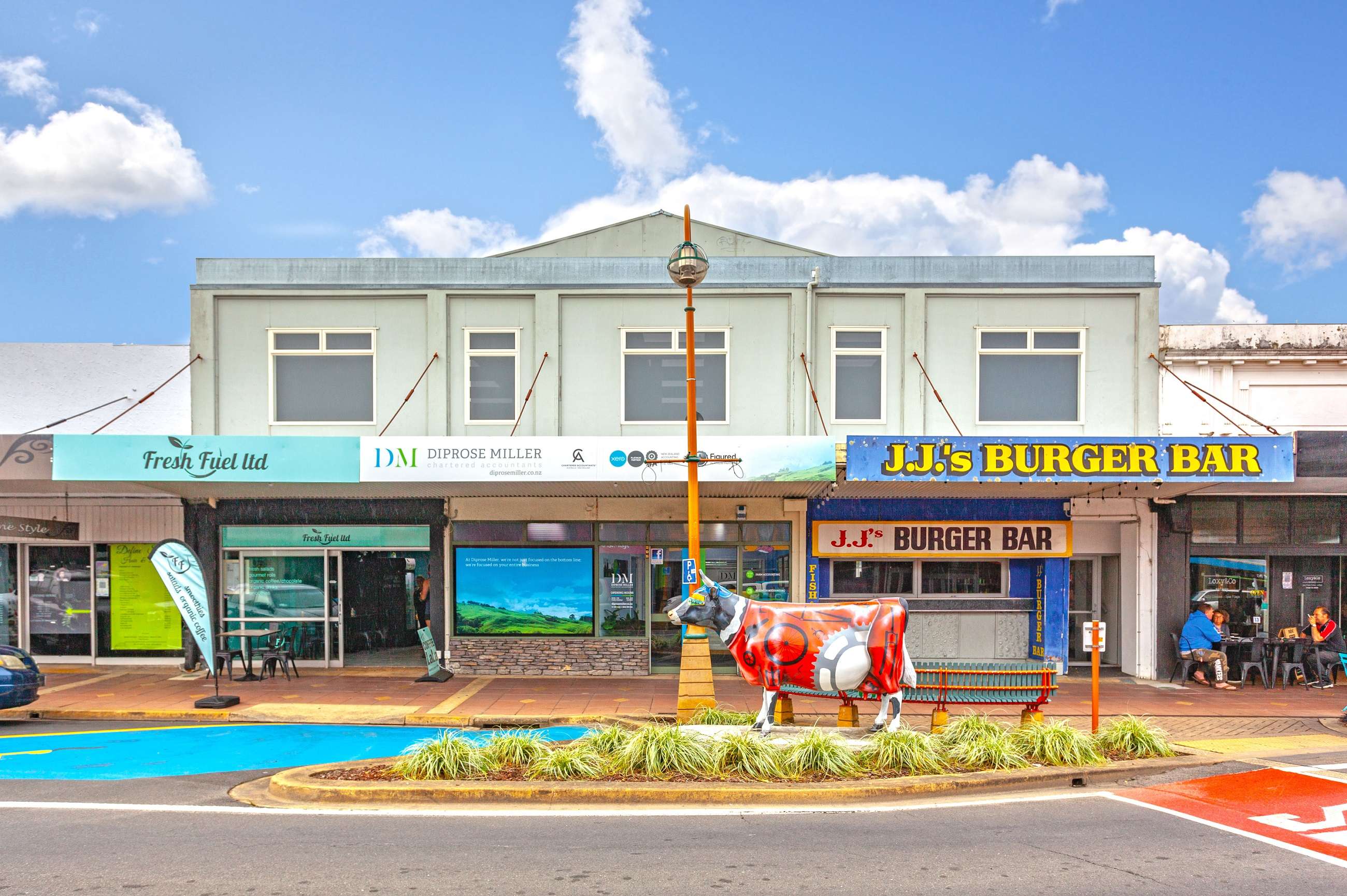 Colourful provincial office, retail block on market, All things ...