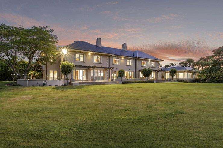 Racing duo’s extra-large manor for sale - comes with indoor climbing ...